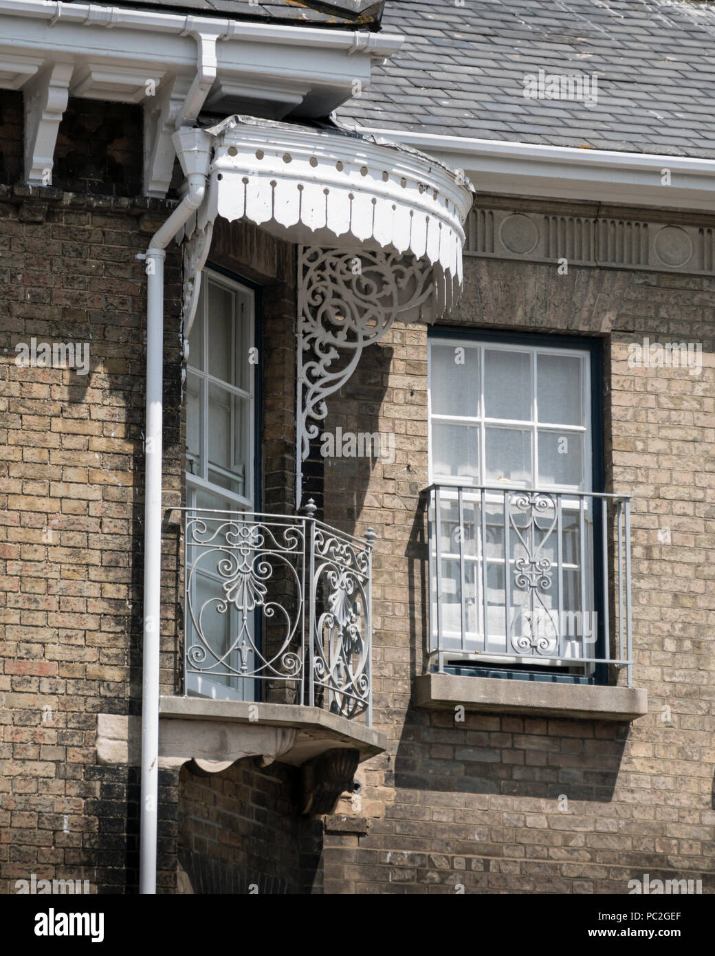 Ornate Victorian window in the historic seaside town of Southwold ...