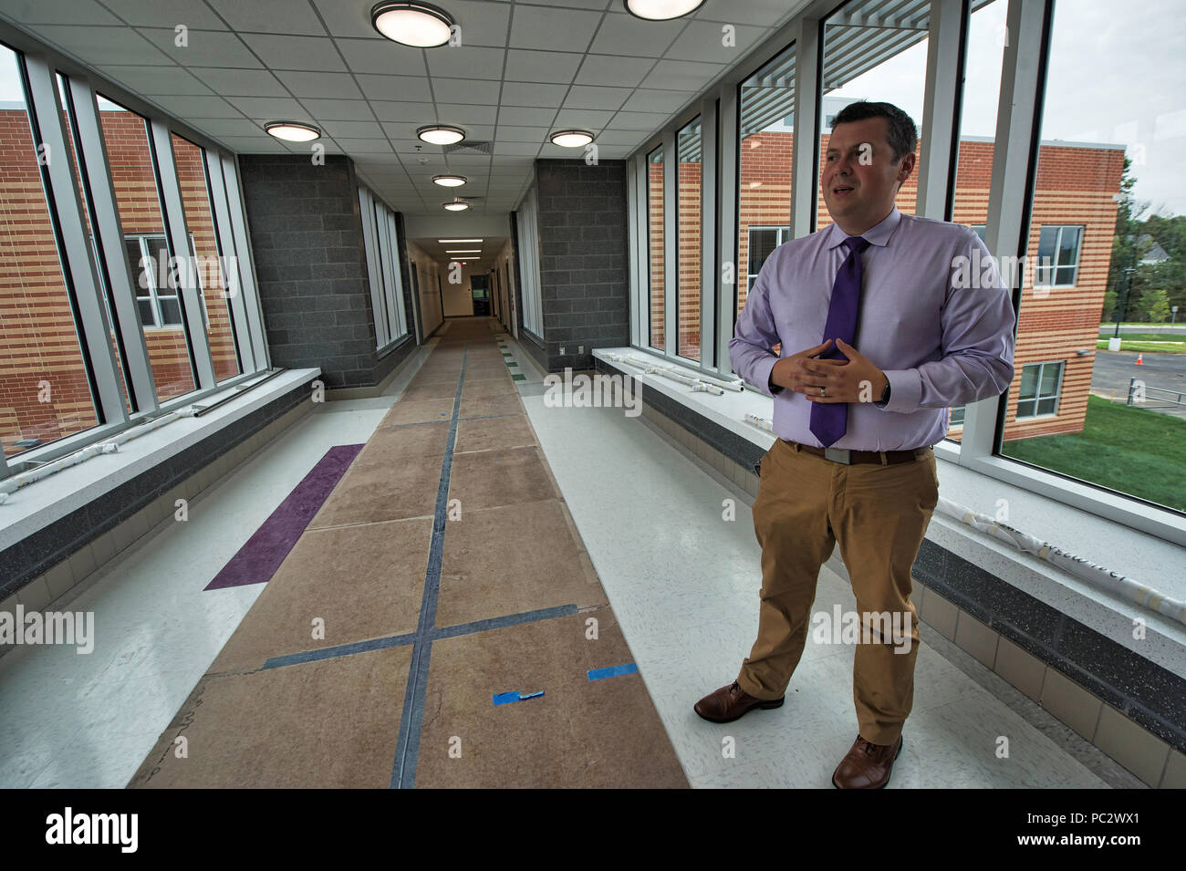 UNITED STATES: July 30, 2018: Principal Jeff Rounsely gives a tour of ...