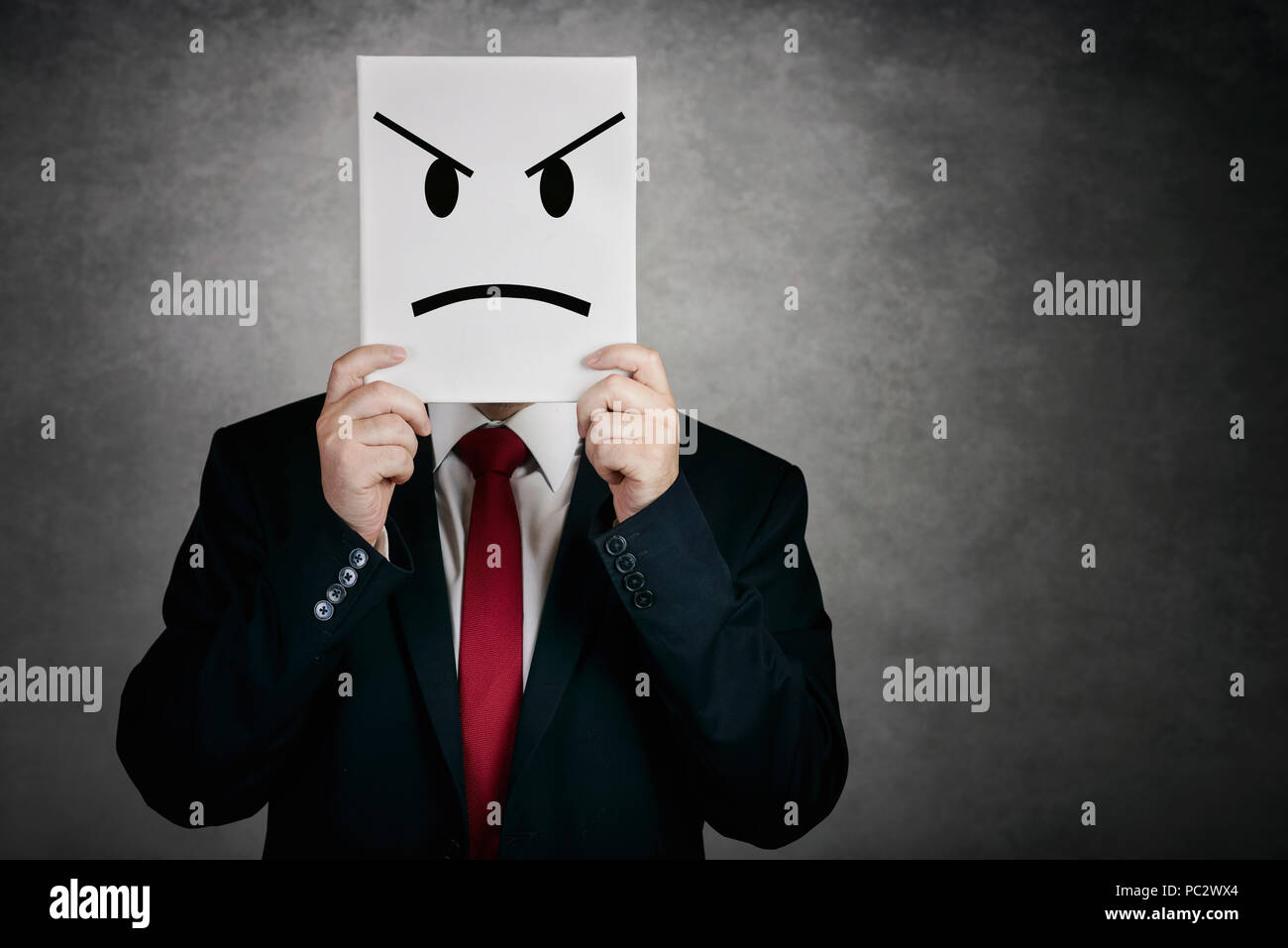 angry man with white board on gray background Stock Photo - Alamy