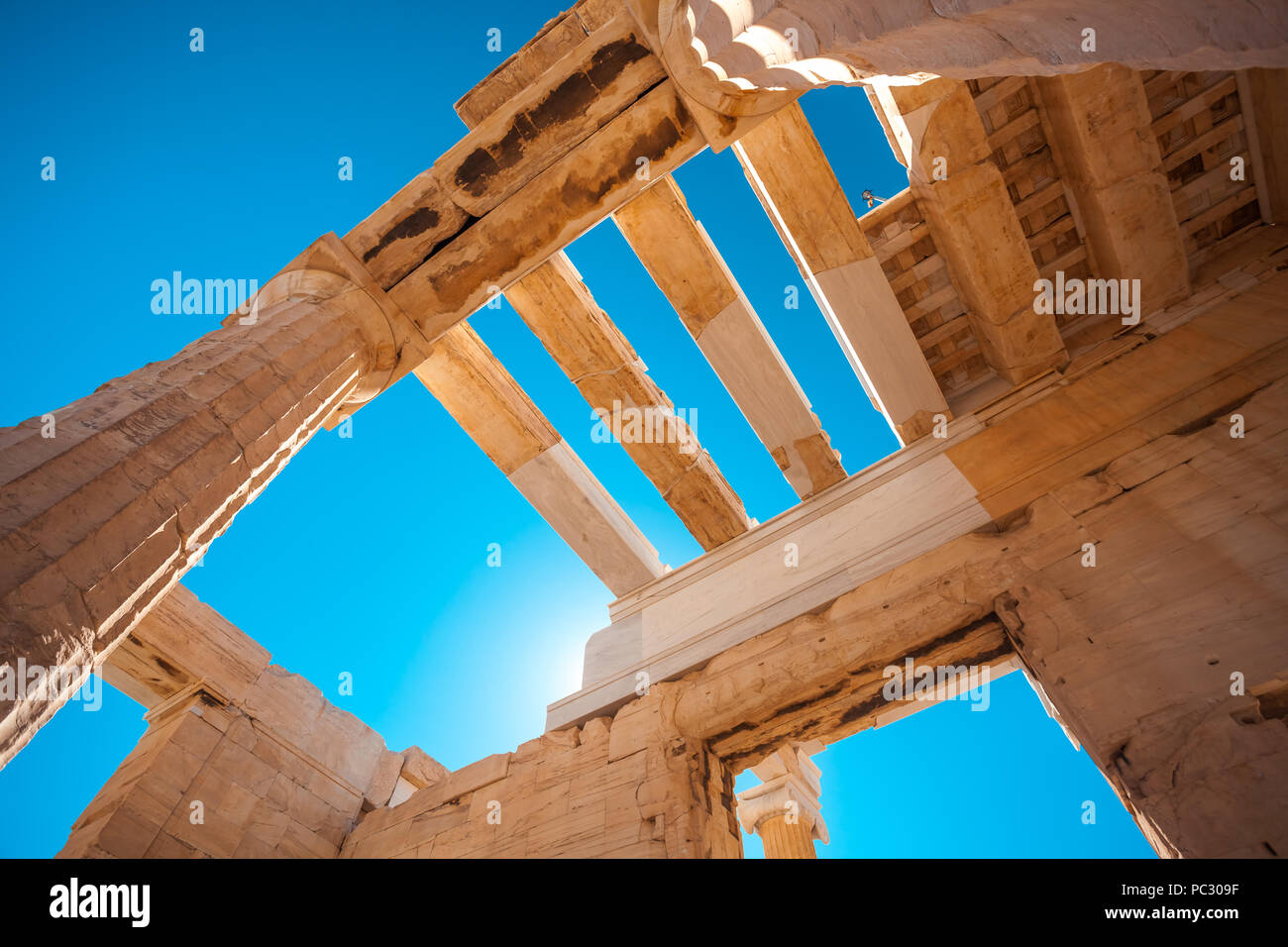 Looking up at a columns of Propylaea gateway in Acropolis of Athens, Greece Stock Photo - Alamy