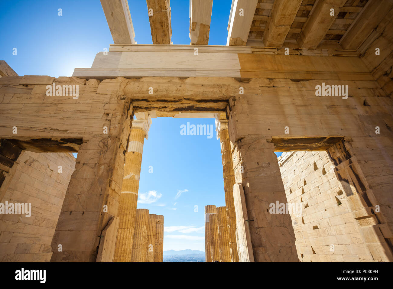 Looking up at a columns of Propylaea gateway in Acropolis of Athens, Greece Stock Photo - Alamy