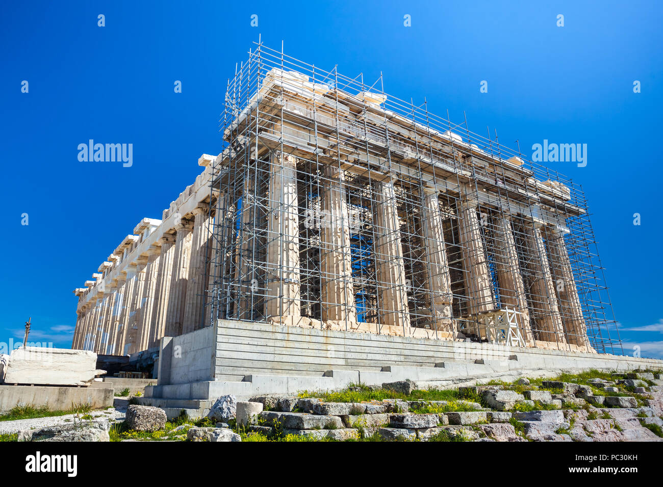 Restoration work in progress at world heritage ancient Parthenon with machine crane, scaffolding ...