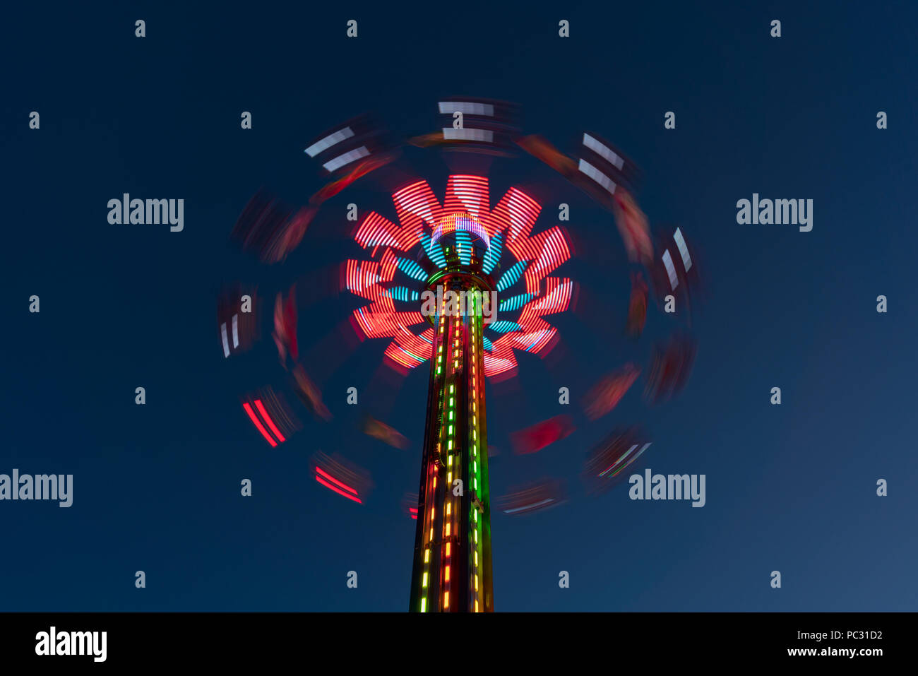 carousel roundabout, swinging turning around Stock Photo - Alamy