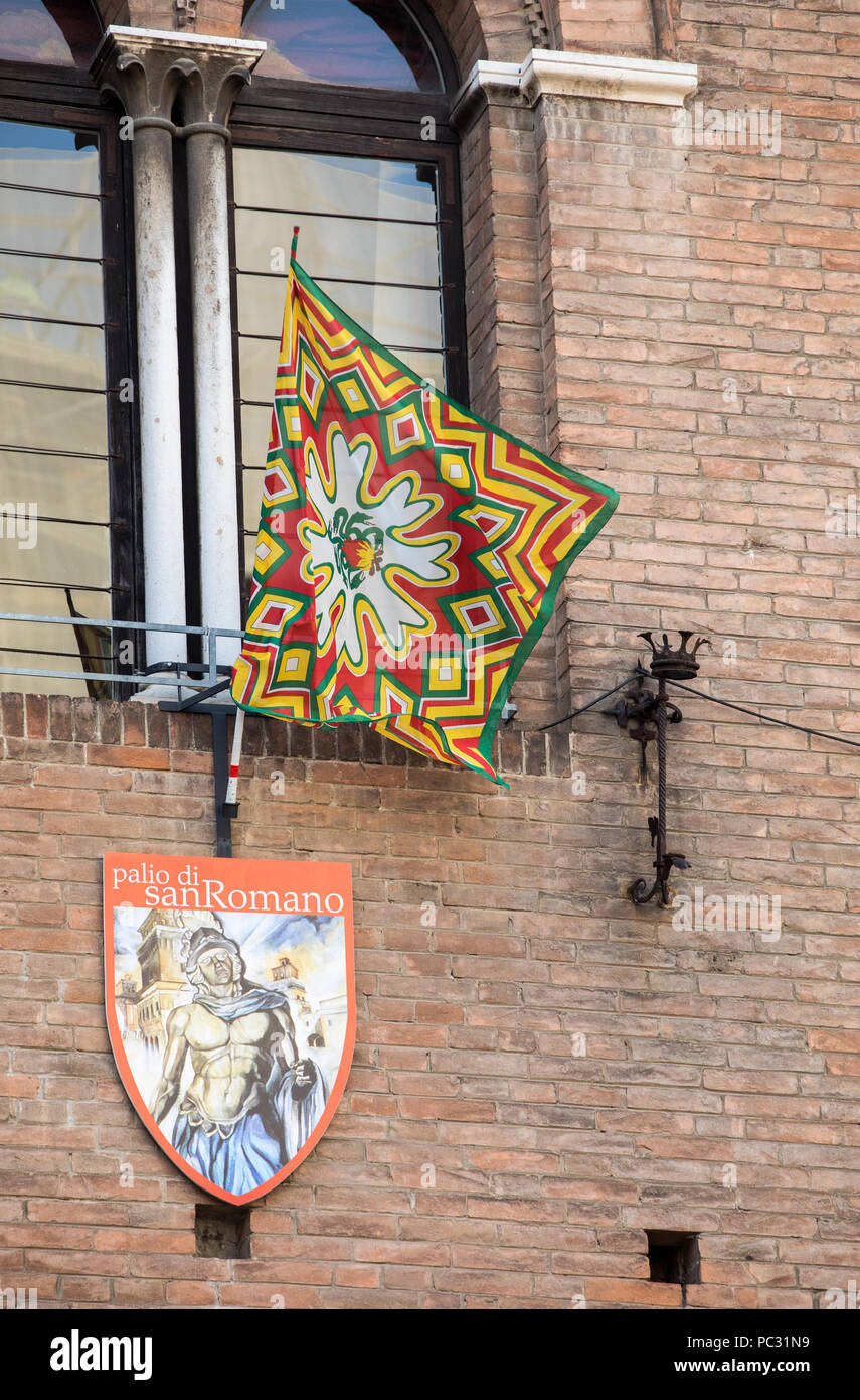 Ferrara, Italy - June 10, 2017: Palio flags and badges. The Palio of St ...