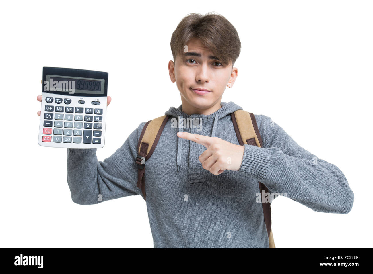 Worried male college student holding a calculator Stock Photo - Alamy