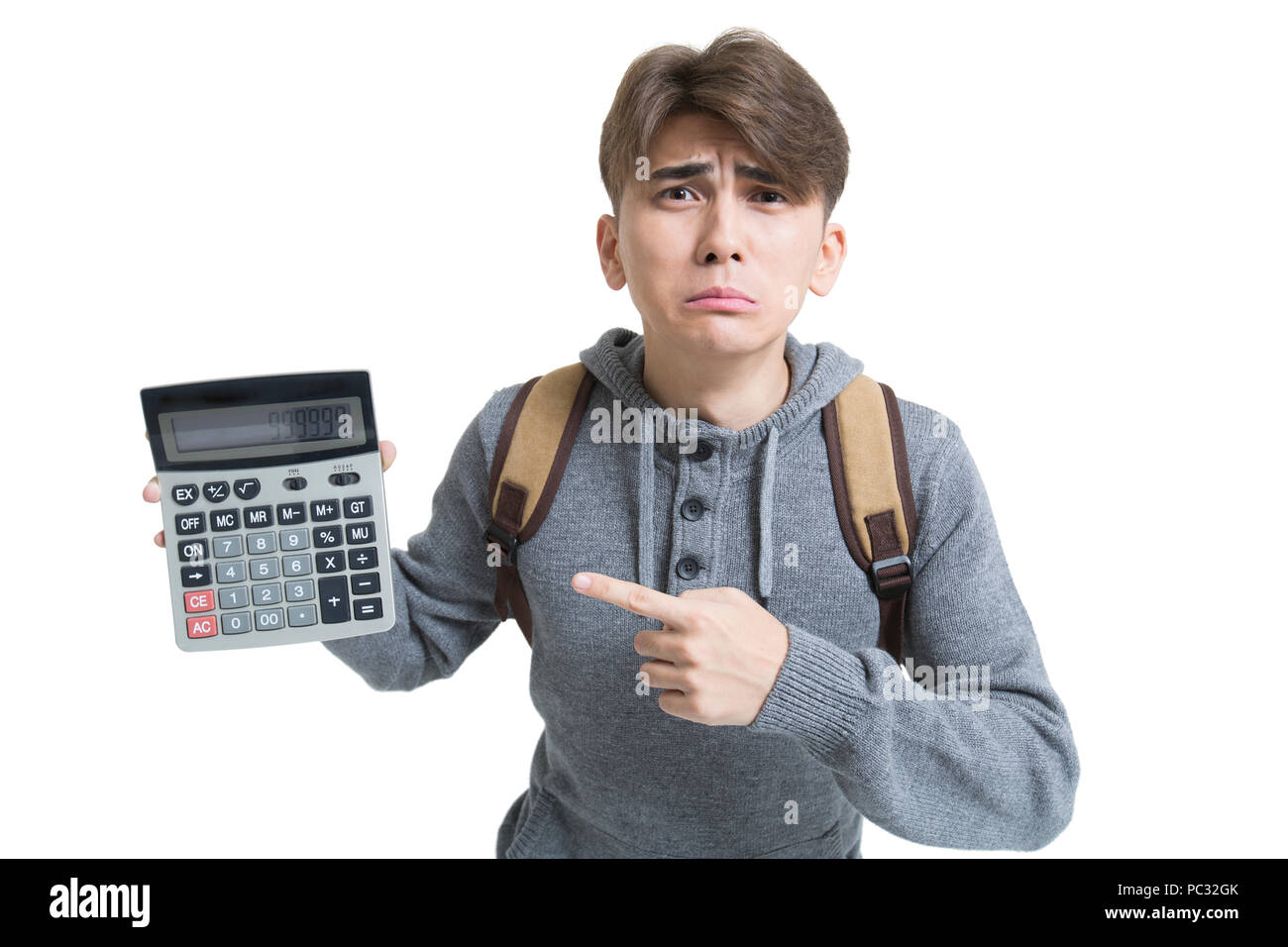 Young man calculator showing hi-res stock photography and images - Alamy