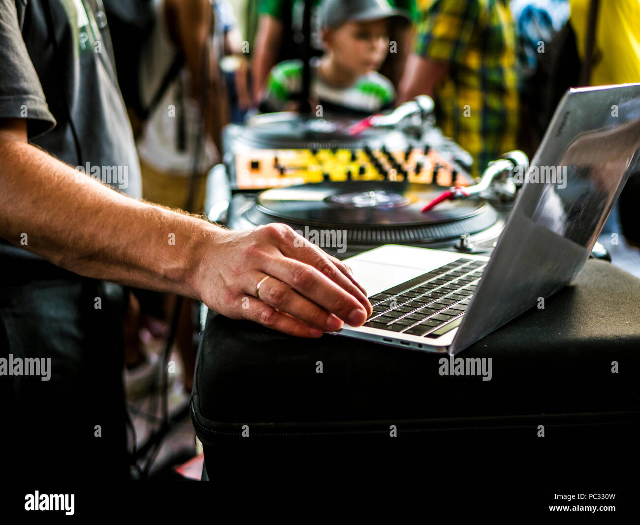 close up hand adjusting music settings on the laptop computer Stock ...