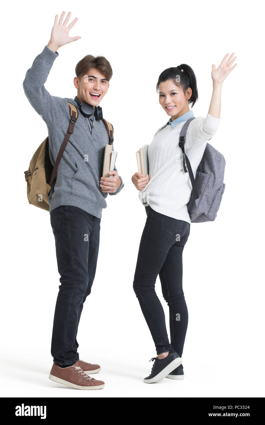 Cheerful college students waving Stock Photo - Alamy