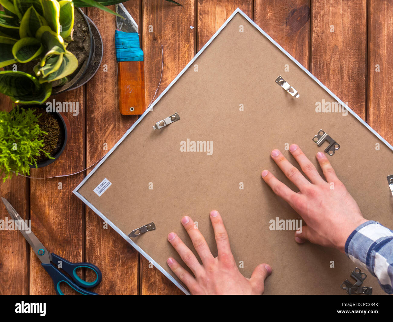 top down photo frame with hands on top Stock Photo - Alamy