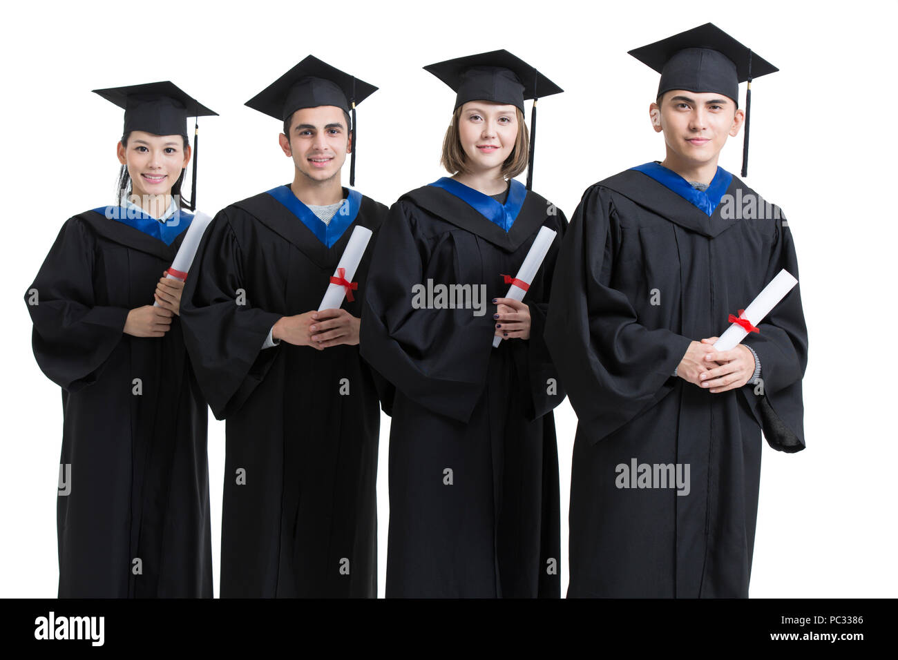 Happy college graduates in graduation gowns Stock Photo - Alamy