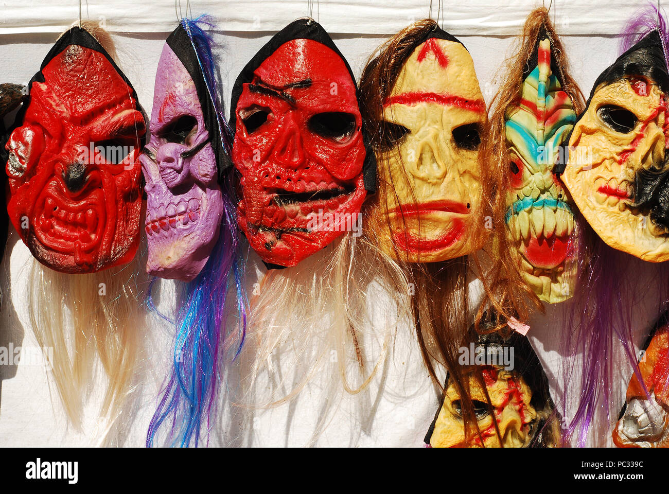 carnival zombie masks at the market Stock Photo - Alamy