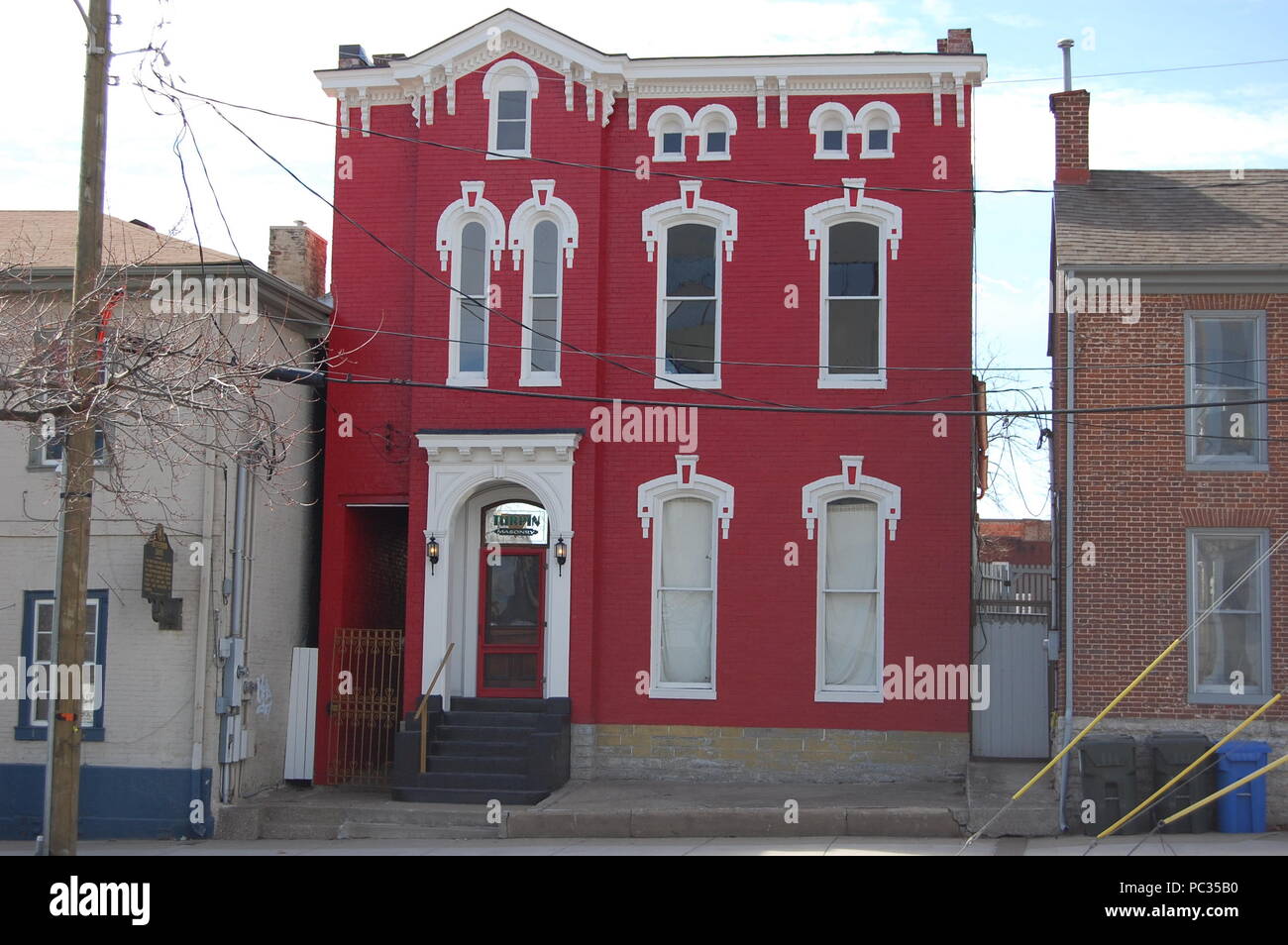 Red house with unusual architecture Stock Photo - Alamy
