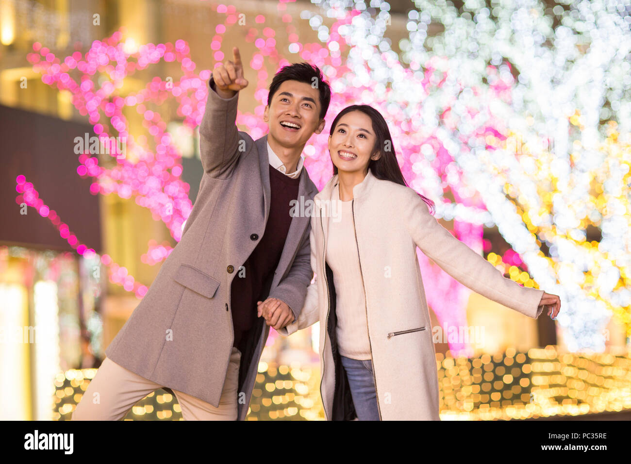 Traditional indian couple holding hands hi-res stock photography and ...