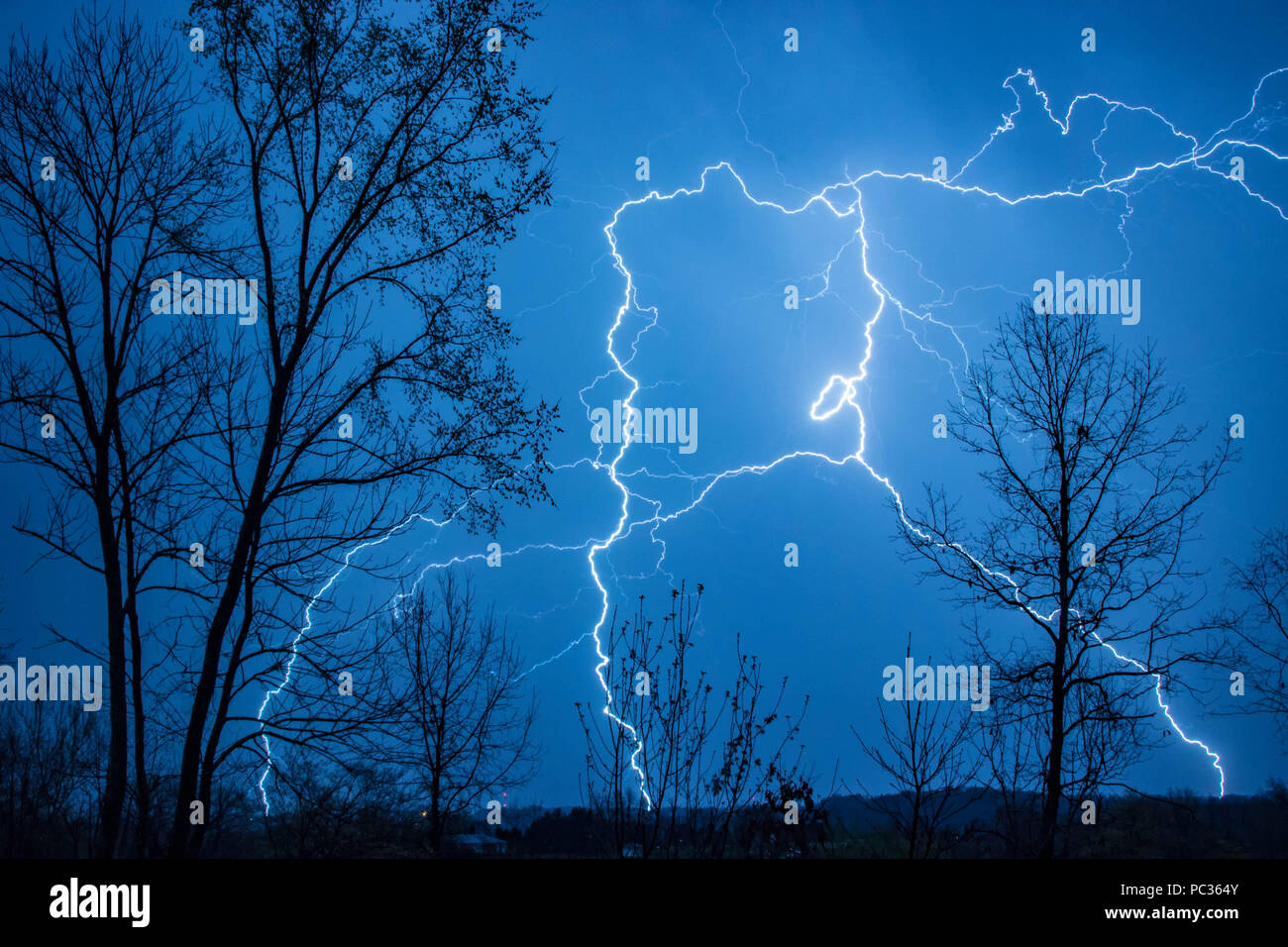 The Night Sky Is Filled With Electricity As A Violent Storm Moves the-night-sky-is-filled-with-electricity-as-a-violent-storm-moves