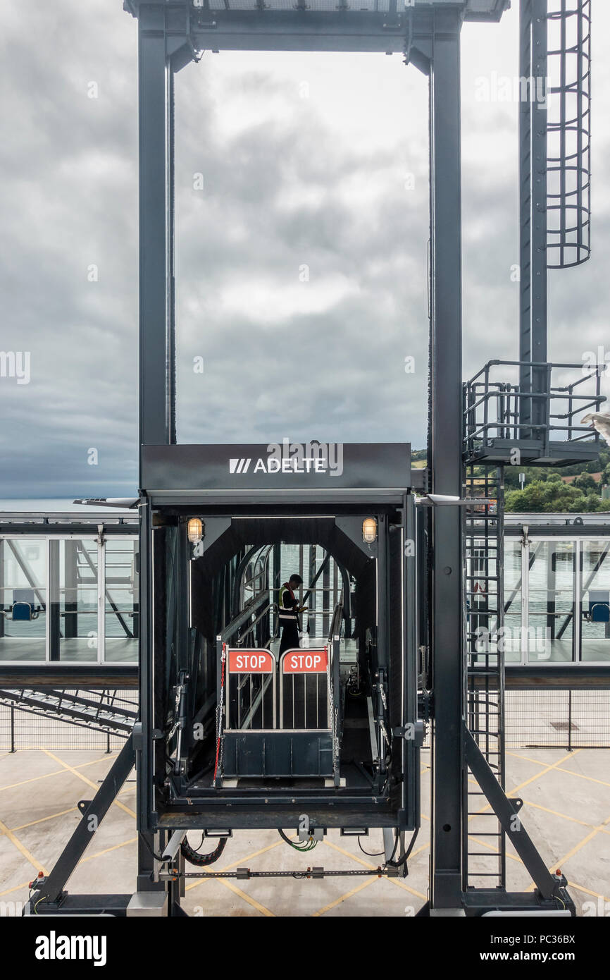 Operator preparing the Adelte Passenger Access Bridge to dock with the ...