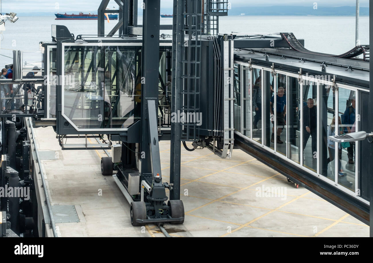 Passengers disembarking the MV Caledonia via the Adelte Passenger ...