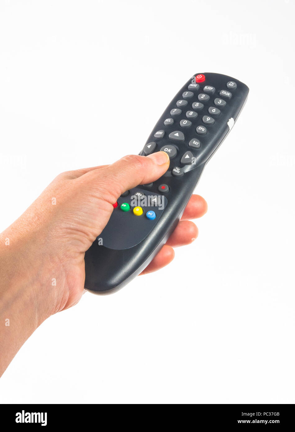 hand holding a remote control on white background Stock Photo - Alamy