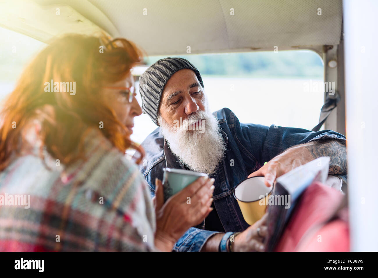Old Man Looking At A Map High Resolution Stock Photography and Images ...