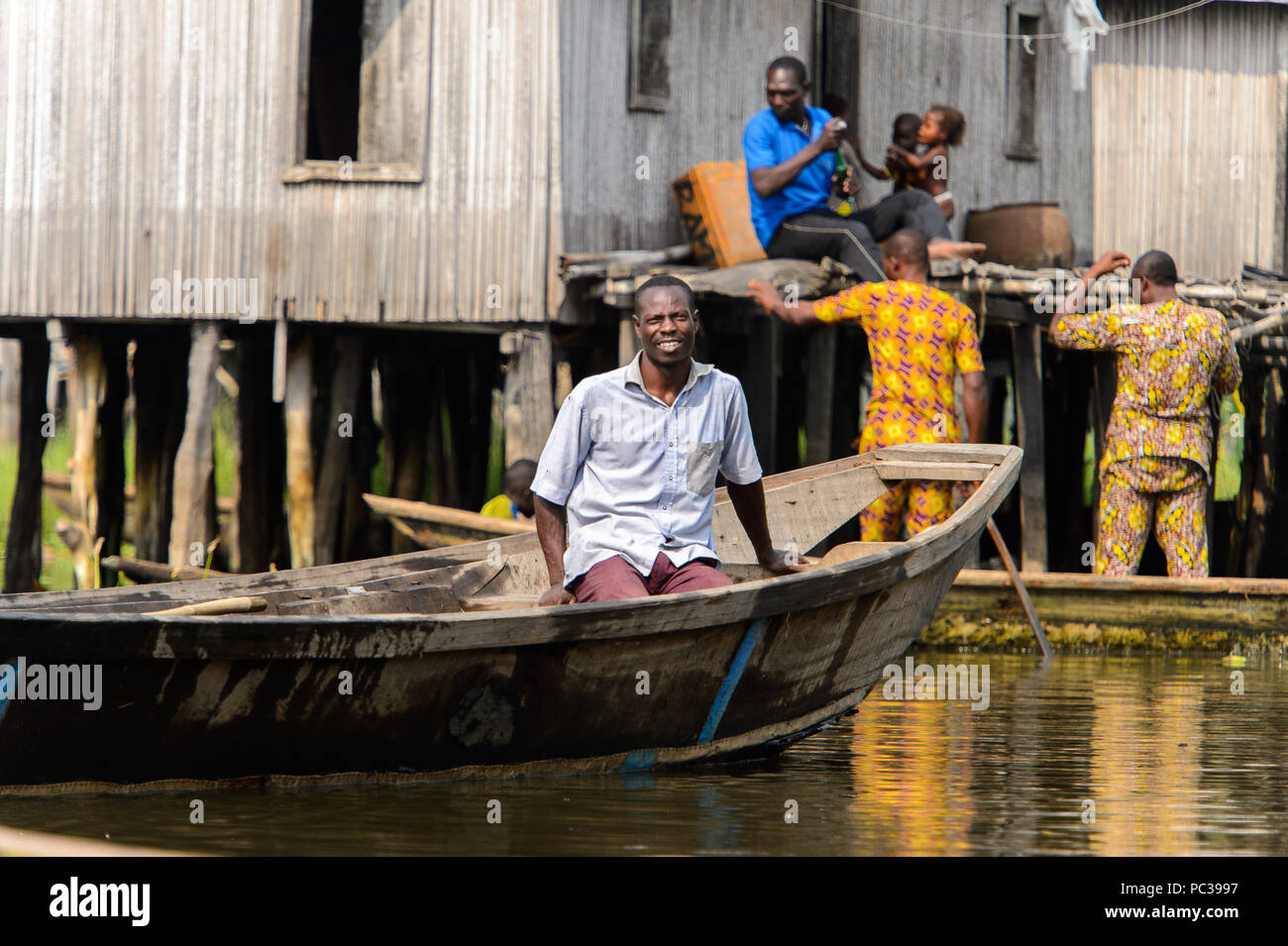 GANVIE, BENIN - JAN 11, 2017: Unidentified Beninese man sails in a ...