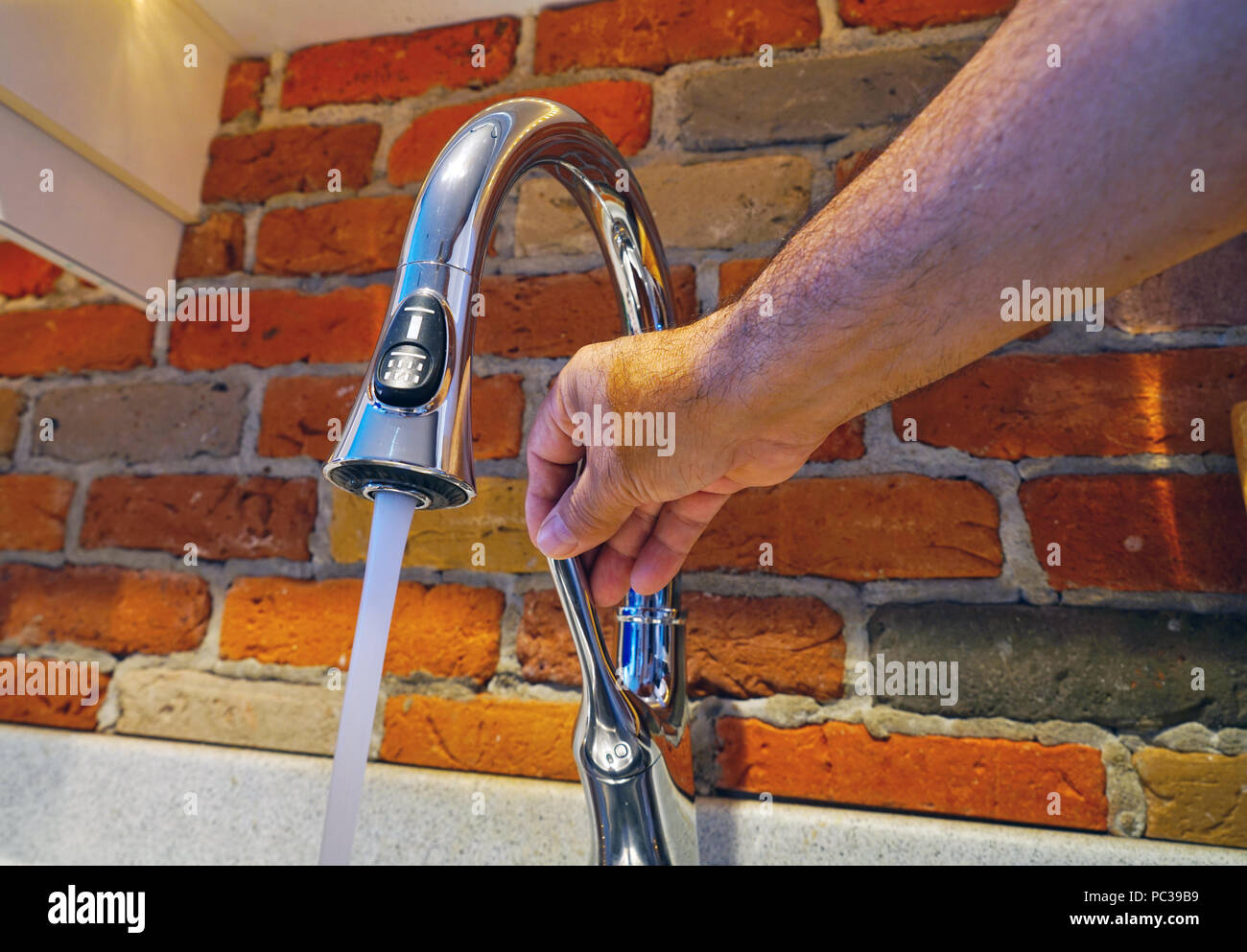 Adjusting water hi-res stock photography and images - Alamy