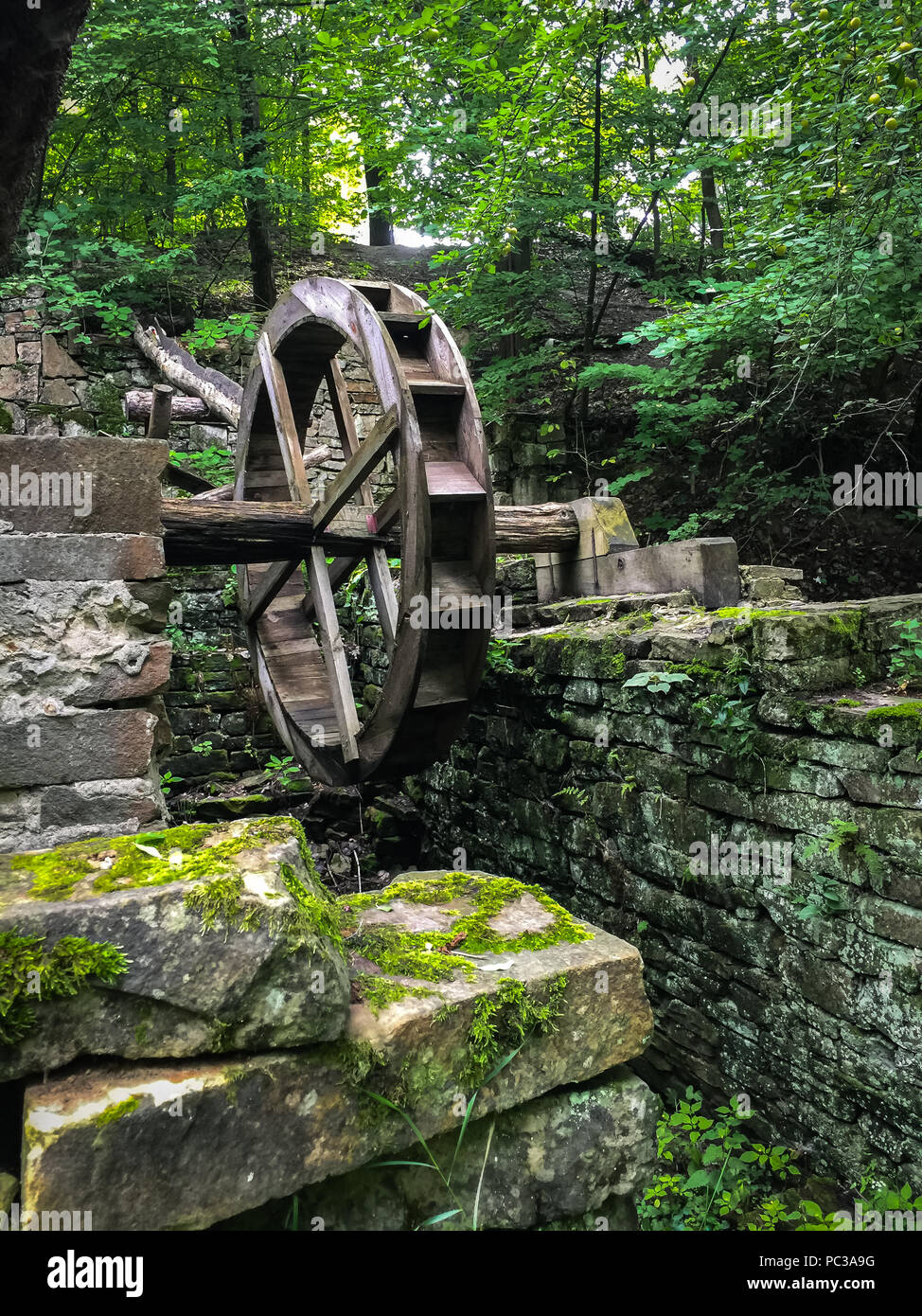 Wooden medieval watermill construction in close up. Old mill in Ukraine ...