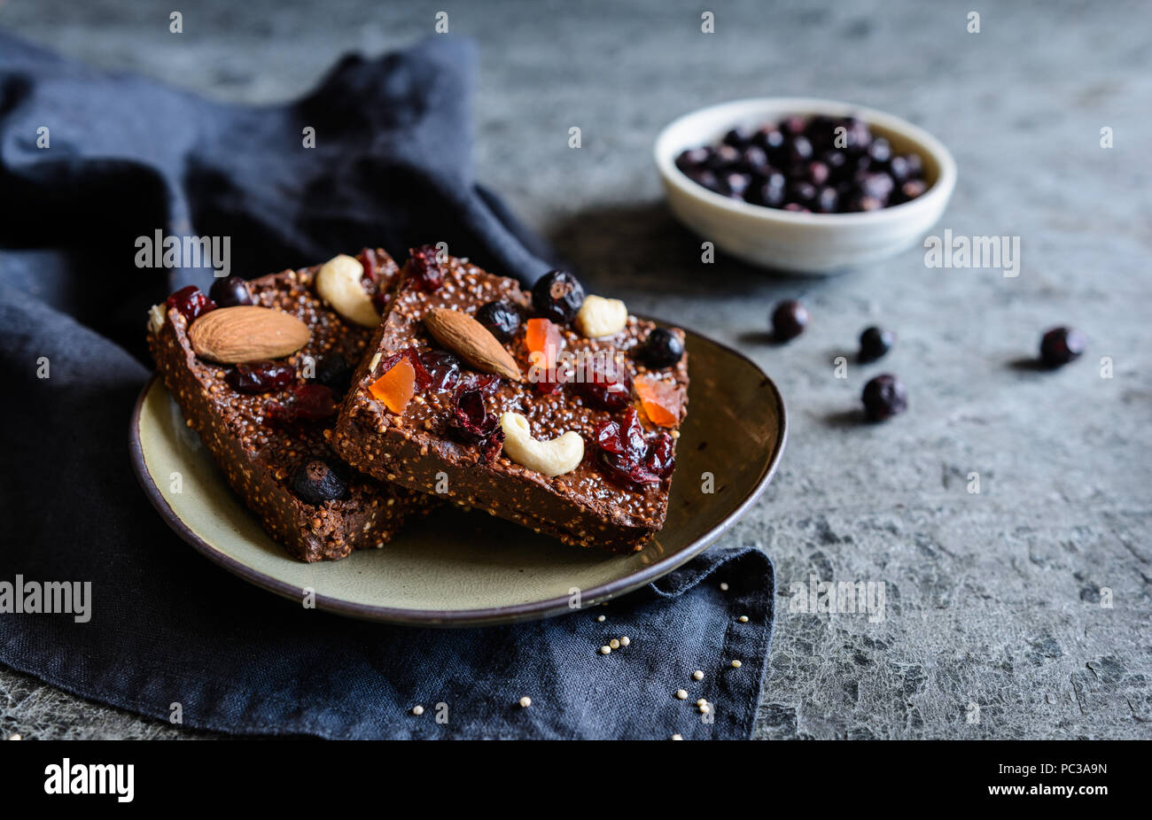 No bake chocolate puffed quinoa bars with freeze dried black currant ...