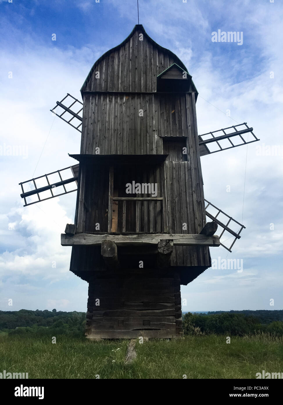 Huge medieval wooden windmill in close up Stock Photo - Alamy