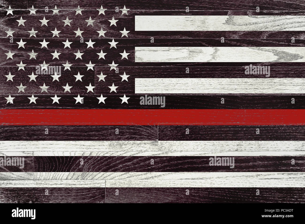A firefighter support flag painted on white washed wood grained boards ...