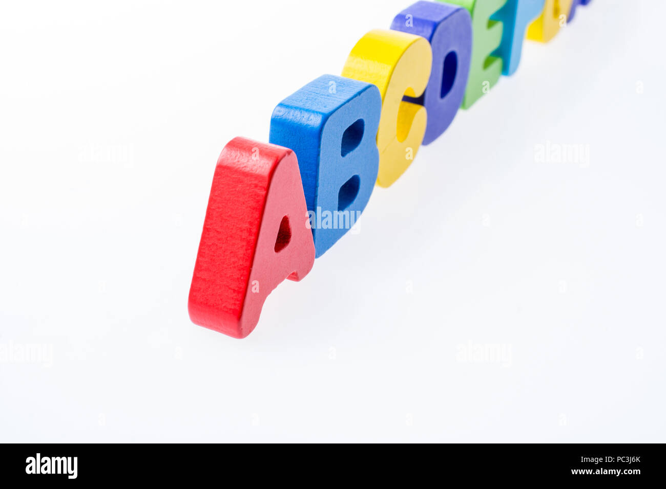 Letter cubes of Alphabet made of wood Stock Photo - Alamy