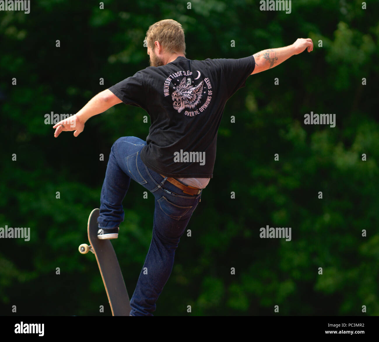 Caucasian man on skateboard in mid air hi-res stock photography and ...