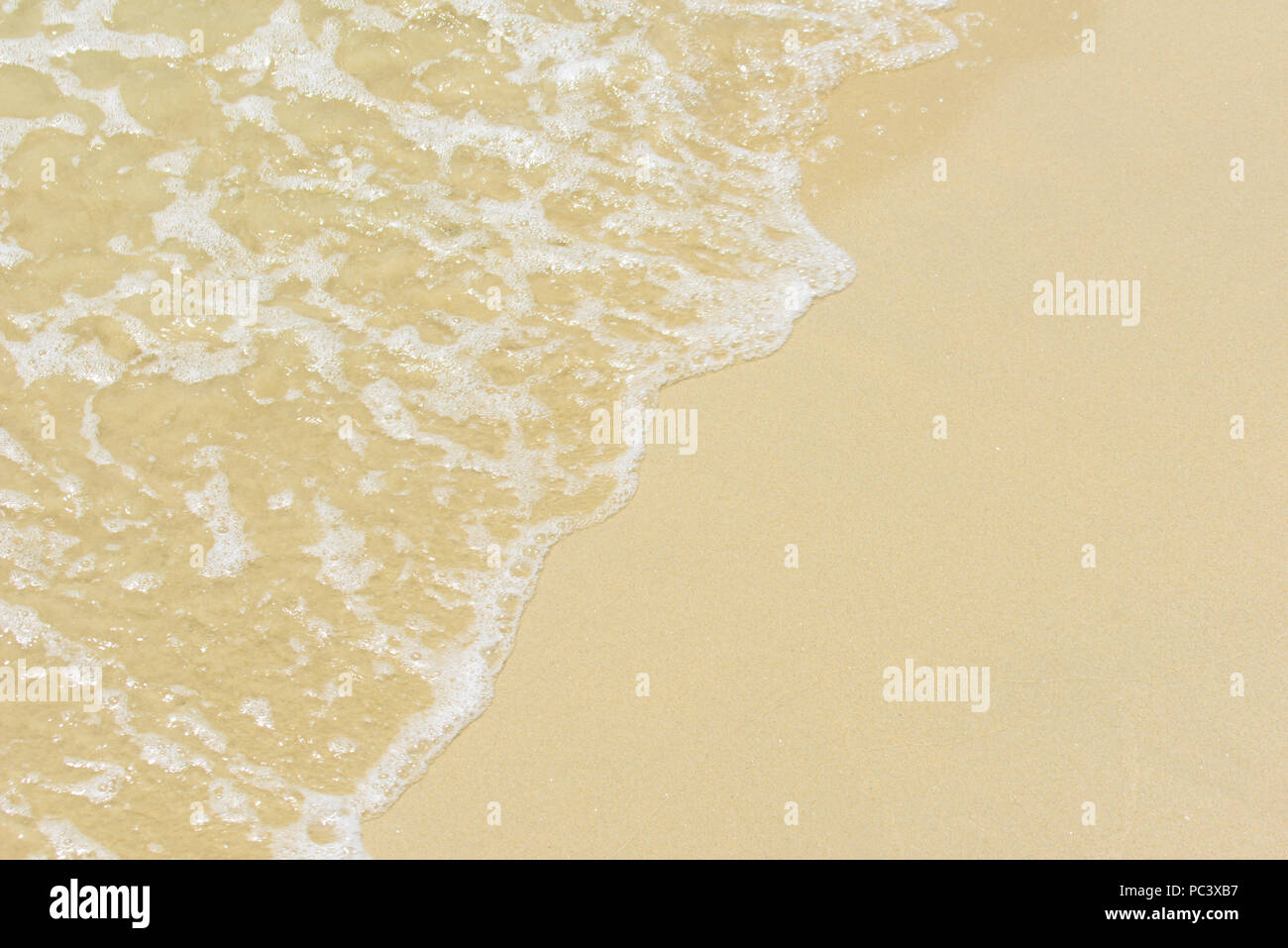 Sand under water. Glare on the sea surface Stock Photo - Alamy