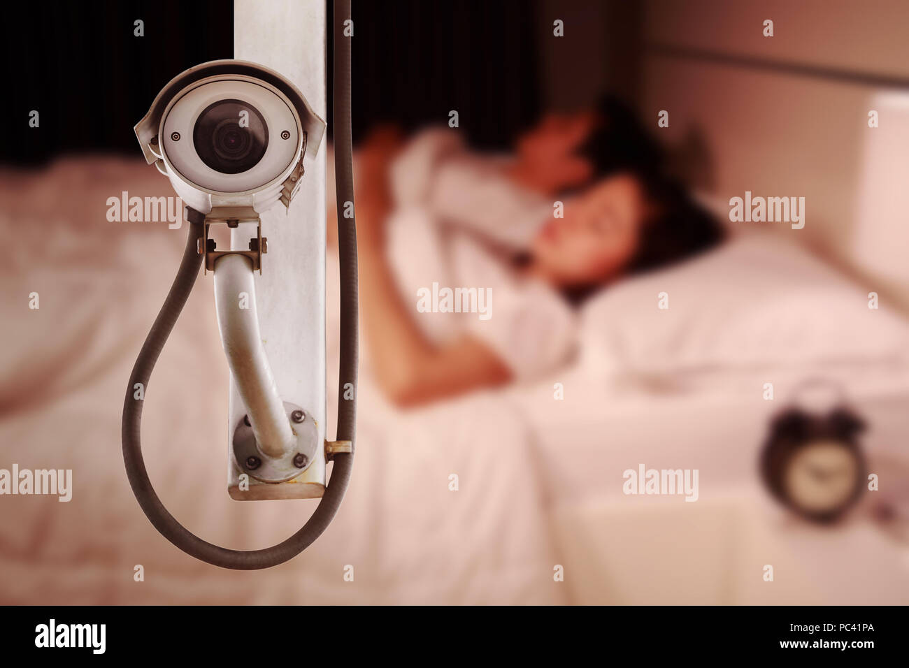 CCTV Camera or surveillance operating with couple sleeping in bedroom ...