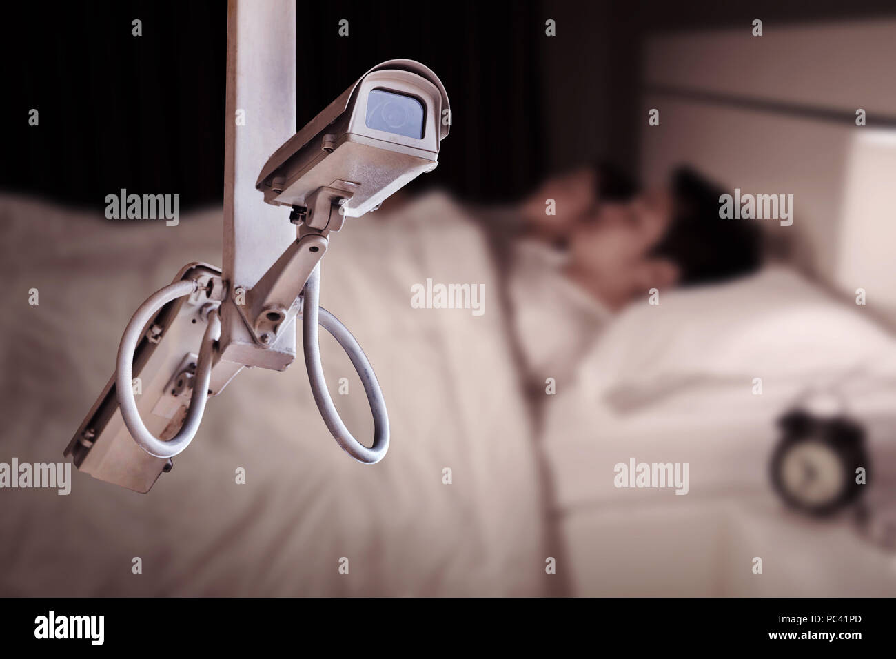 CCTV Camera or surveillance operating with couple sleeping in bedroom ...