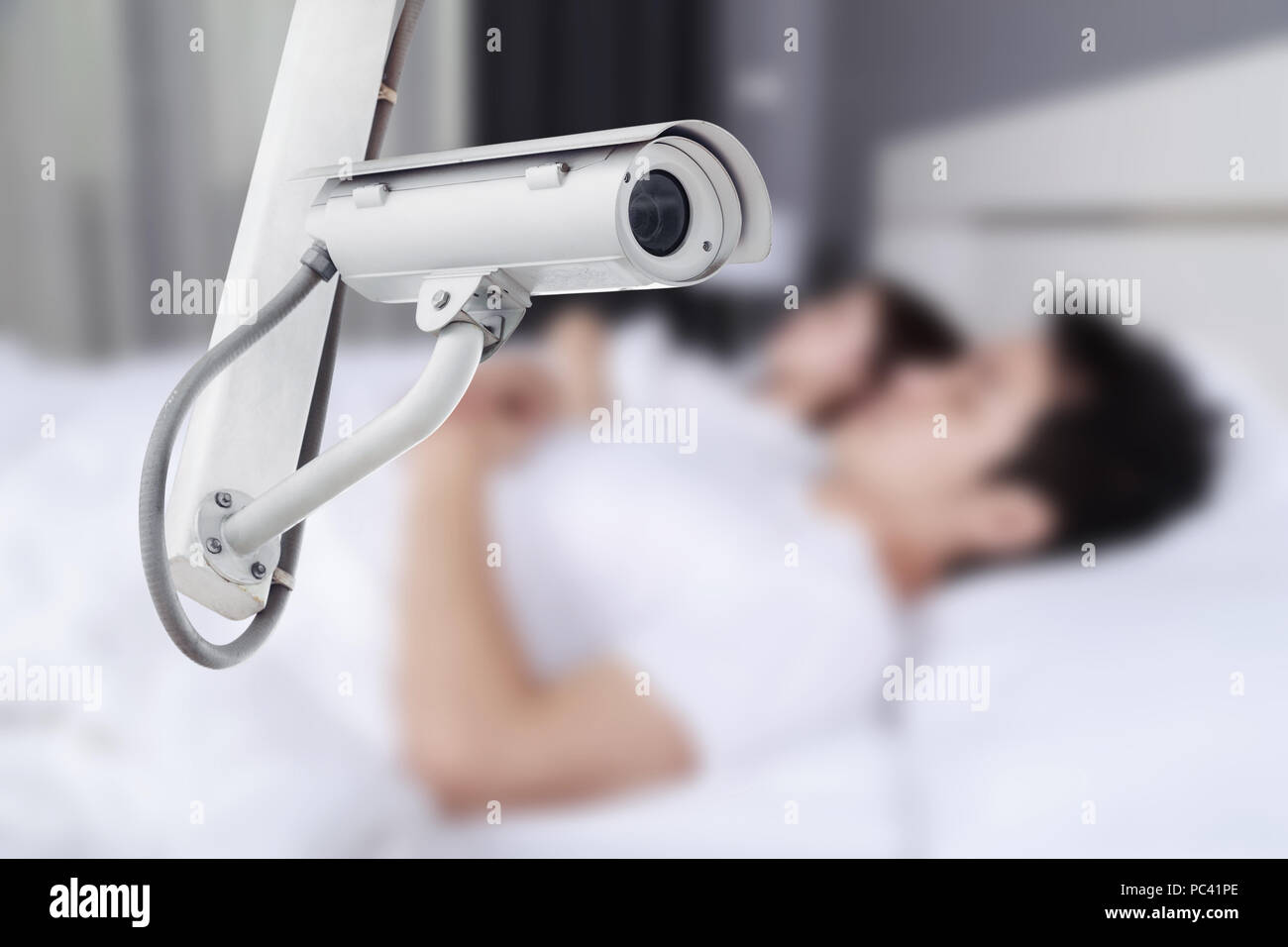 CCTV Camera or surveillance operating with couple sleeping in bedroom ...