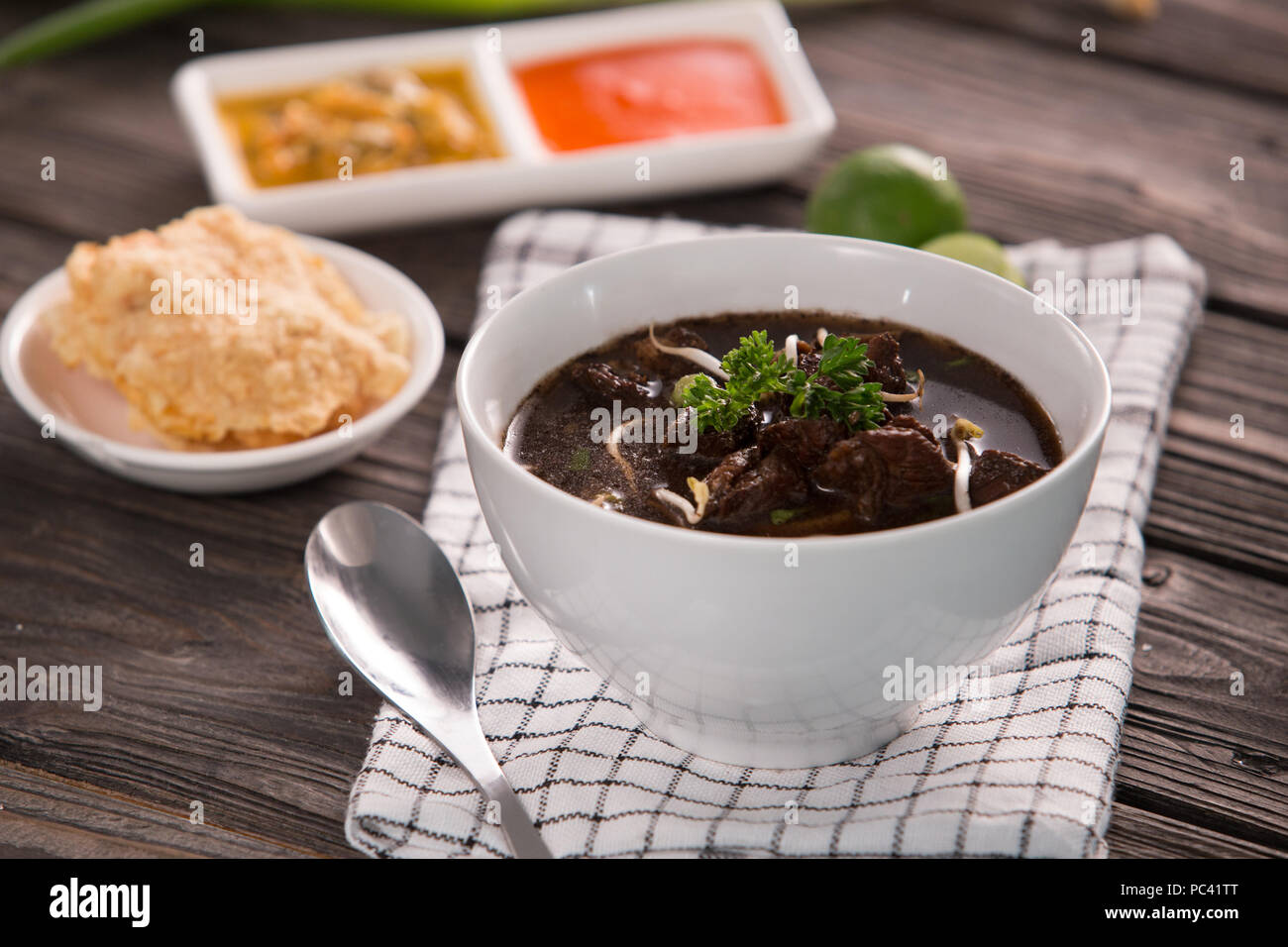 Rawon. traditional Indonesian beef black soup Stock Photo - Alamy