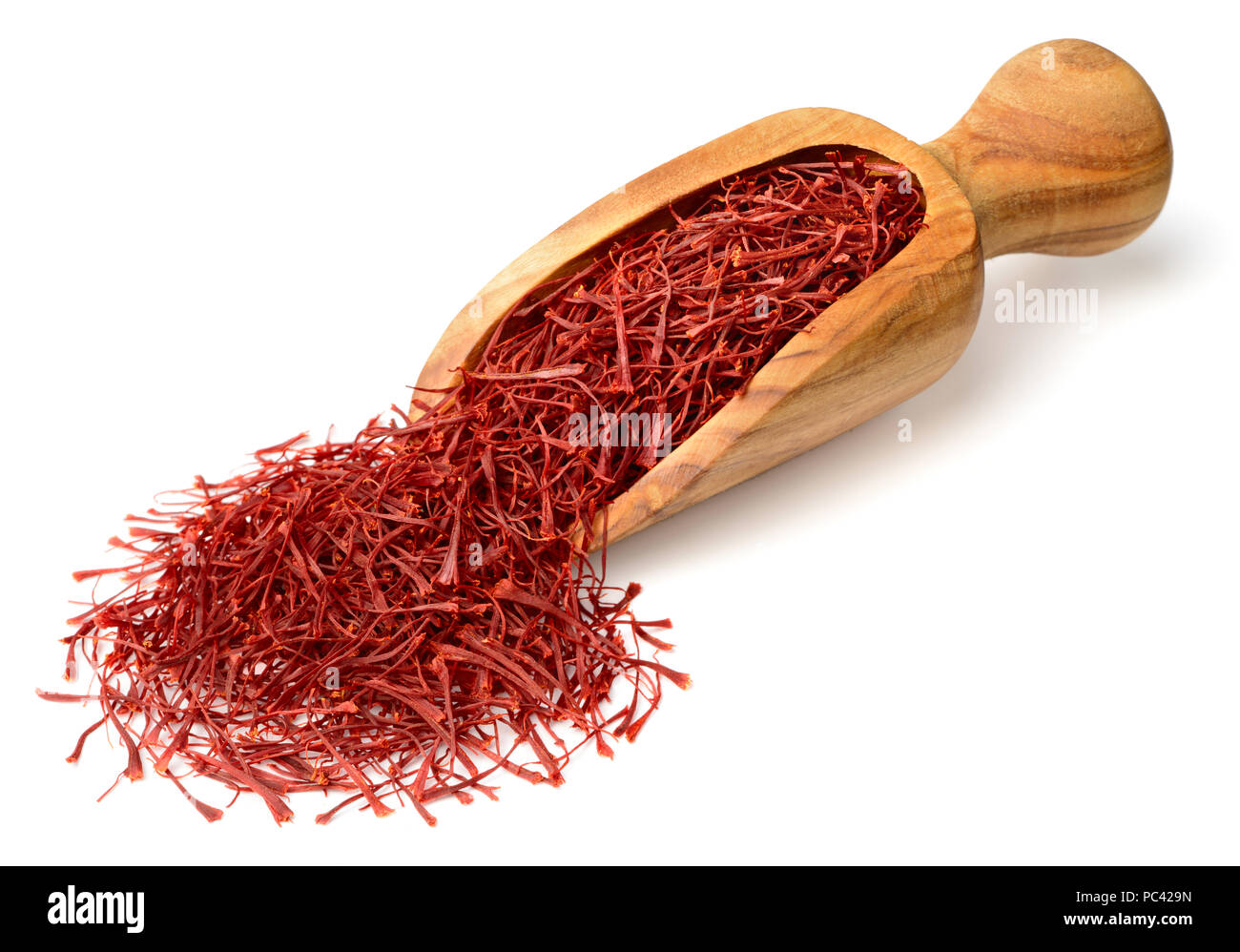 saffron thread in the wooden scoop, isolated on white background Stock ...