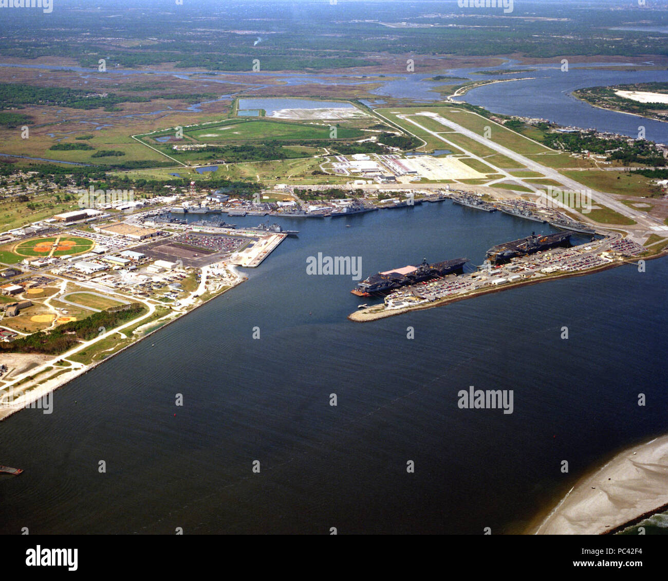 Aerial NS Mayport with CV-60 and CV-64 1993. An aerial view, looking ...