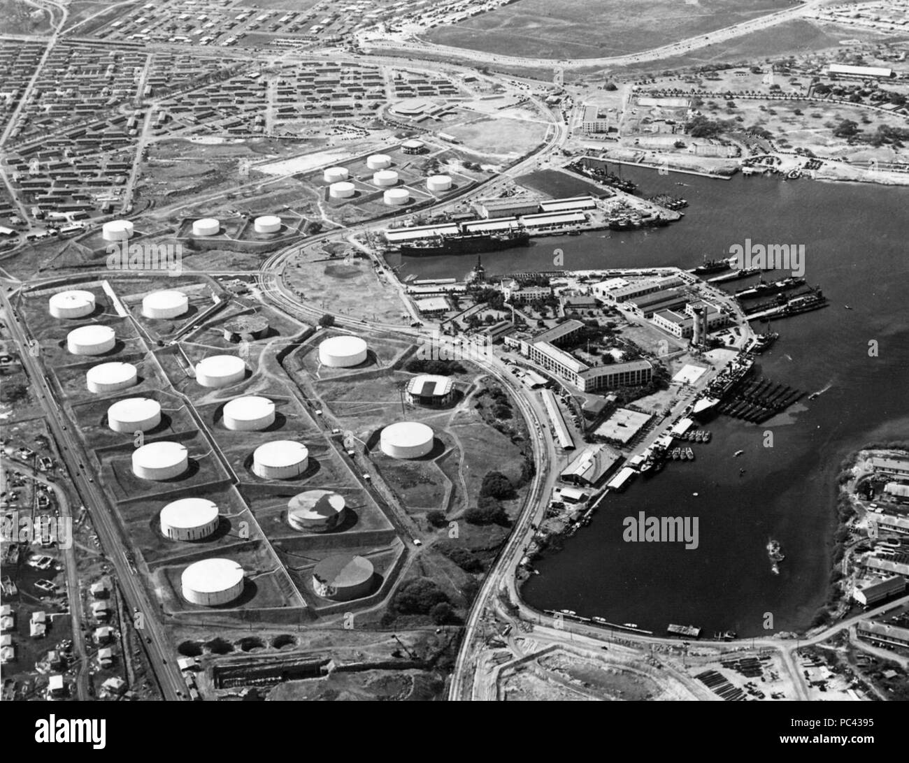 Aerial view of the Pearl Harbor submarine base and adjacent fuel tank ...