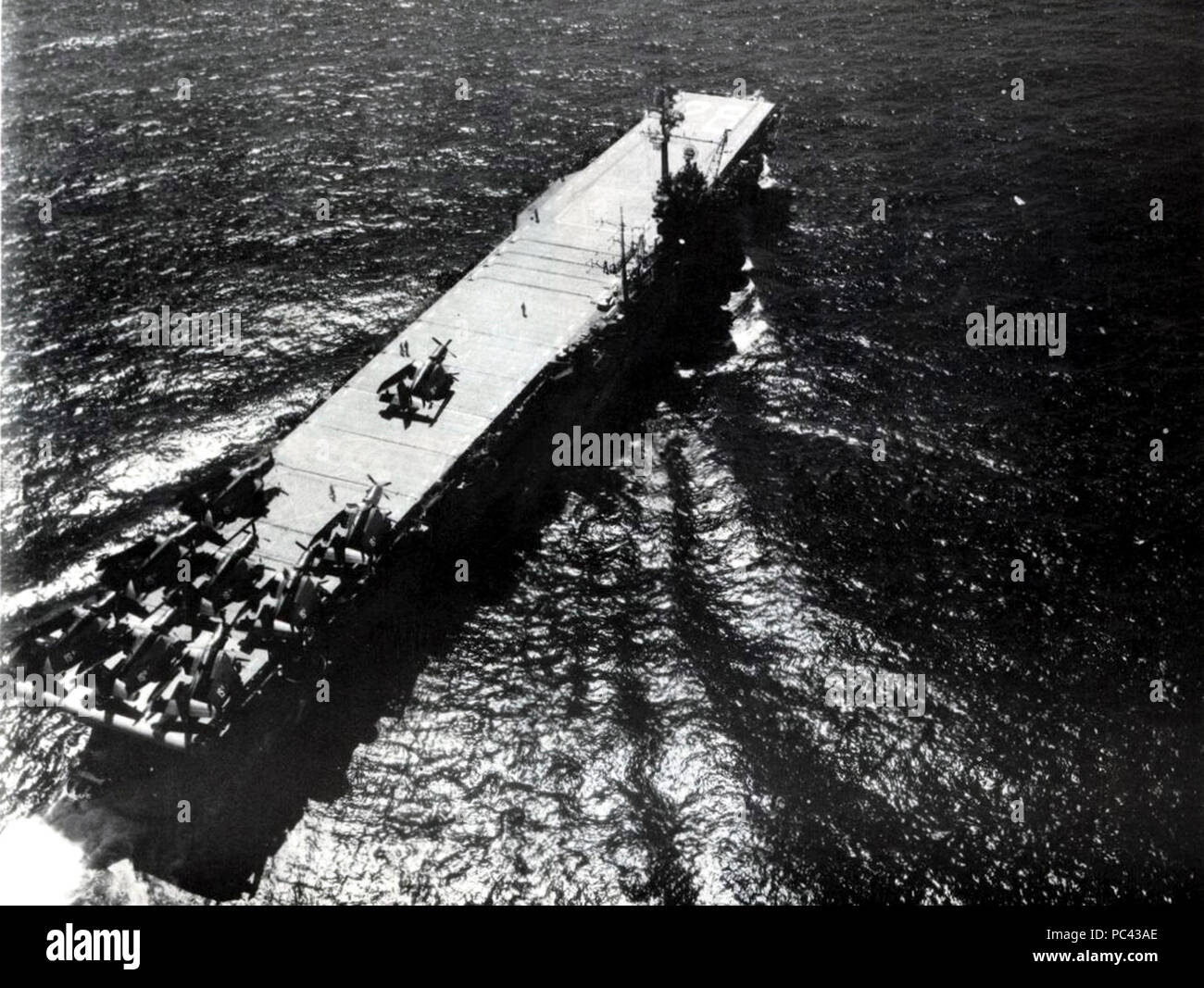 Aerial view of USS Cabot (CVL-28) underway in early 1952 Stock Photo ...