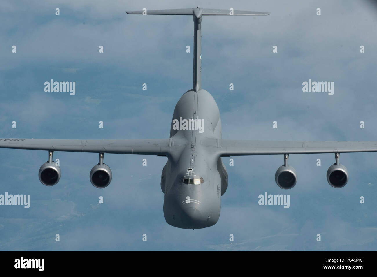 A C-5 Galaxy with Dover Air Force Base, Delaware flies to the boom of a ...