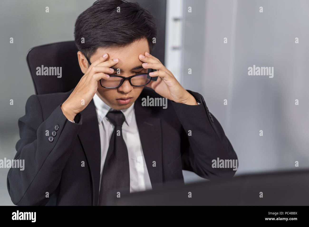 young business man working problem using laptop Stock Photo - Alamy