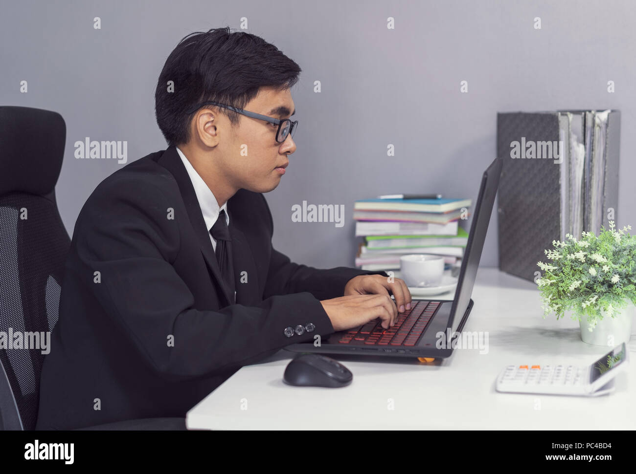 young business man using laptop computer Stock Photo - Alamy