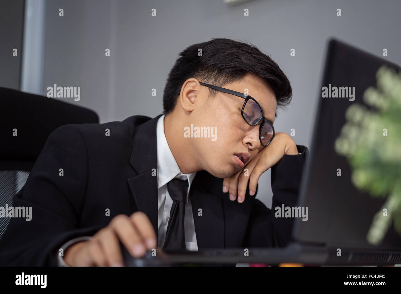 Japanese businessman asleep hi-res stock photography and images - Alamy