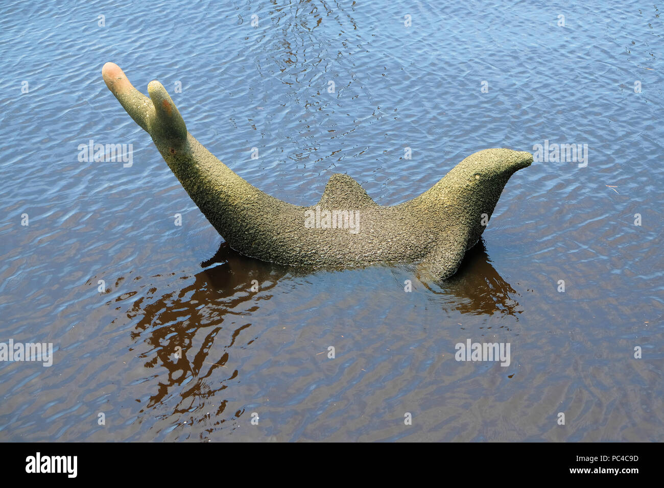 Stone dolphin hi-res stock photography and images - Alamy