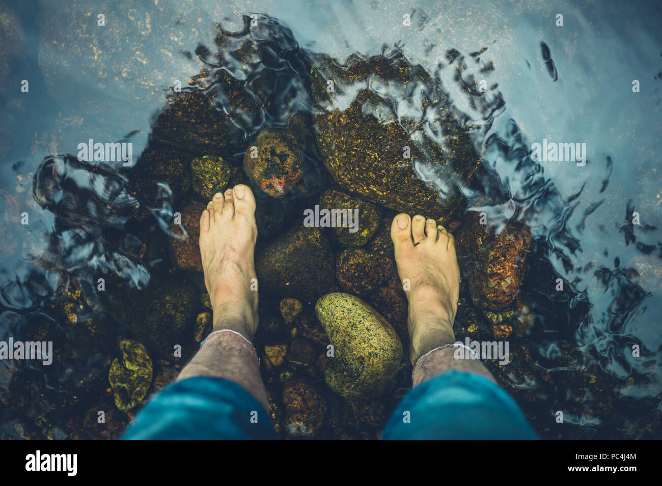 Feet legs in water river hi-res stock photography and images - Alamy