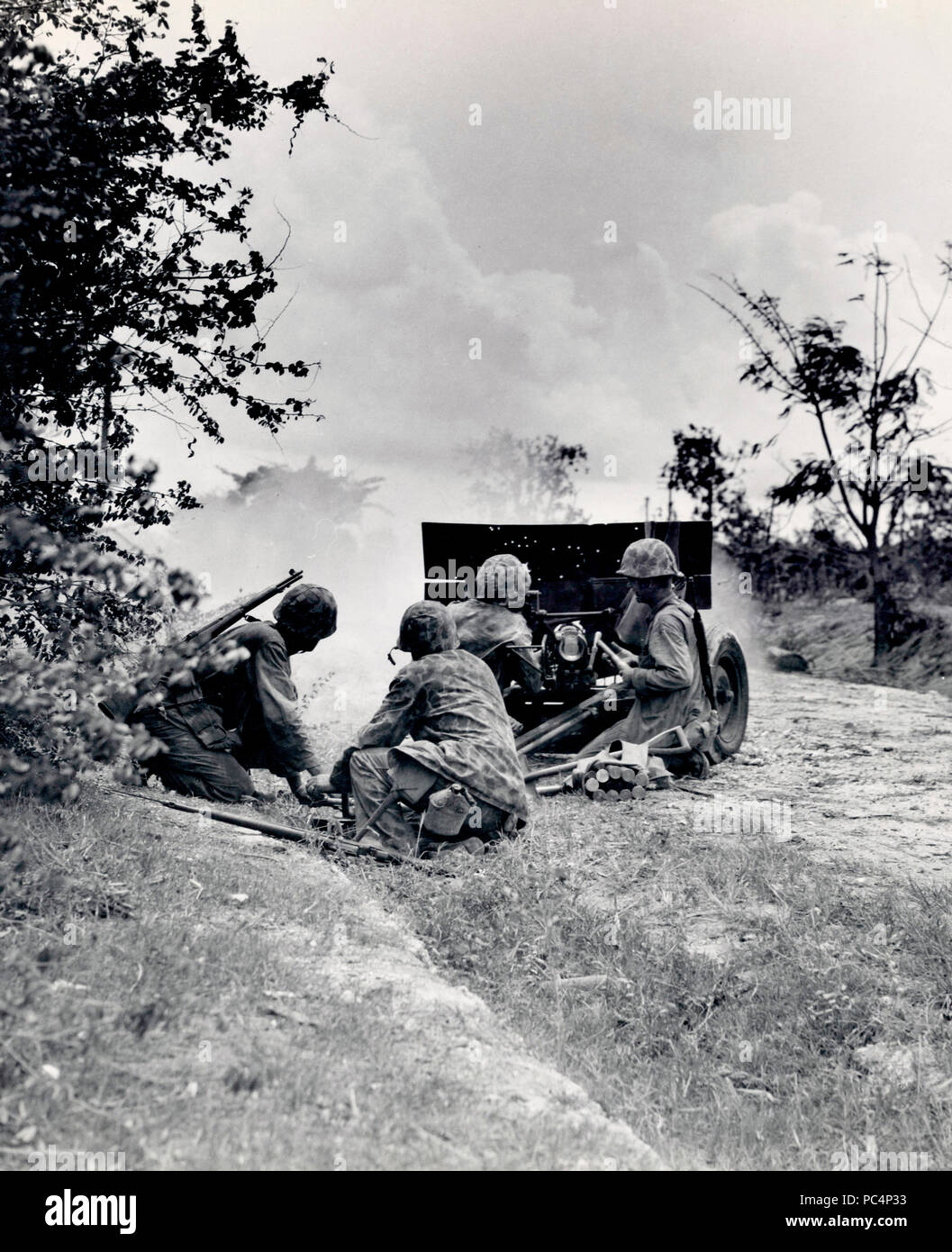 Marines fire rounds from 37mm gun on Saipan Stock Photo - Alamy