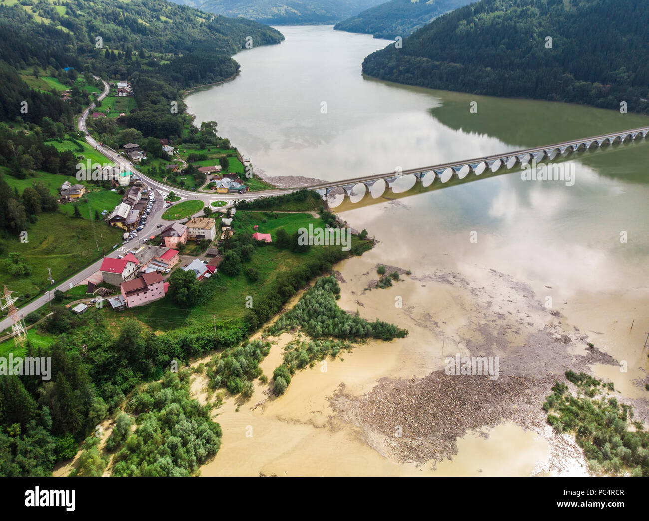 flooded water. Bicaz lake and viaduct, Romania Stock Photo - Alamy