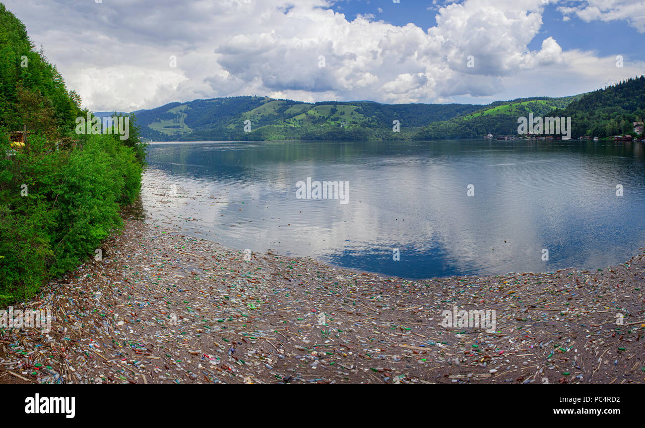 lake pollution with plastic bags and toxic waste in the water Stock ...