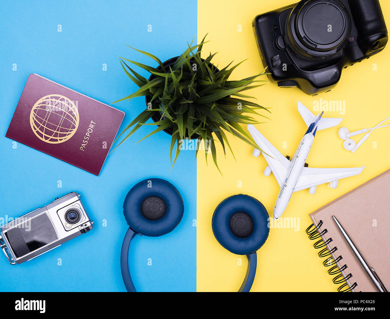 flat lay traveler photographer accessories on yellow background. camera ...