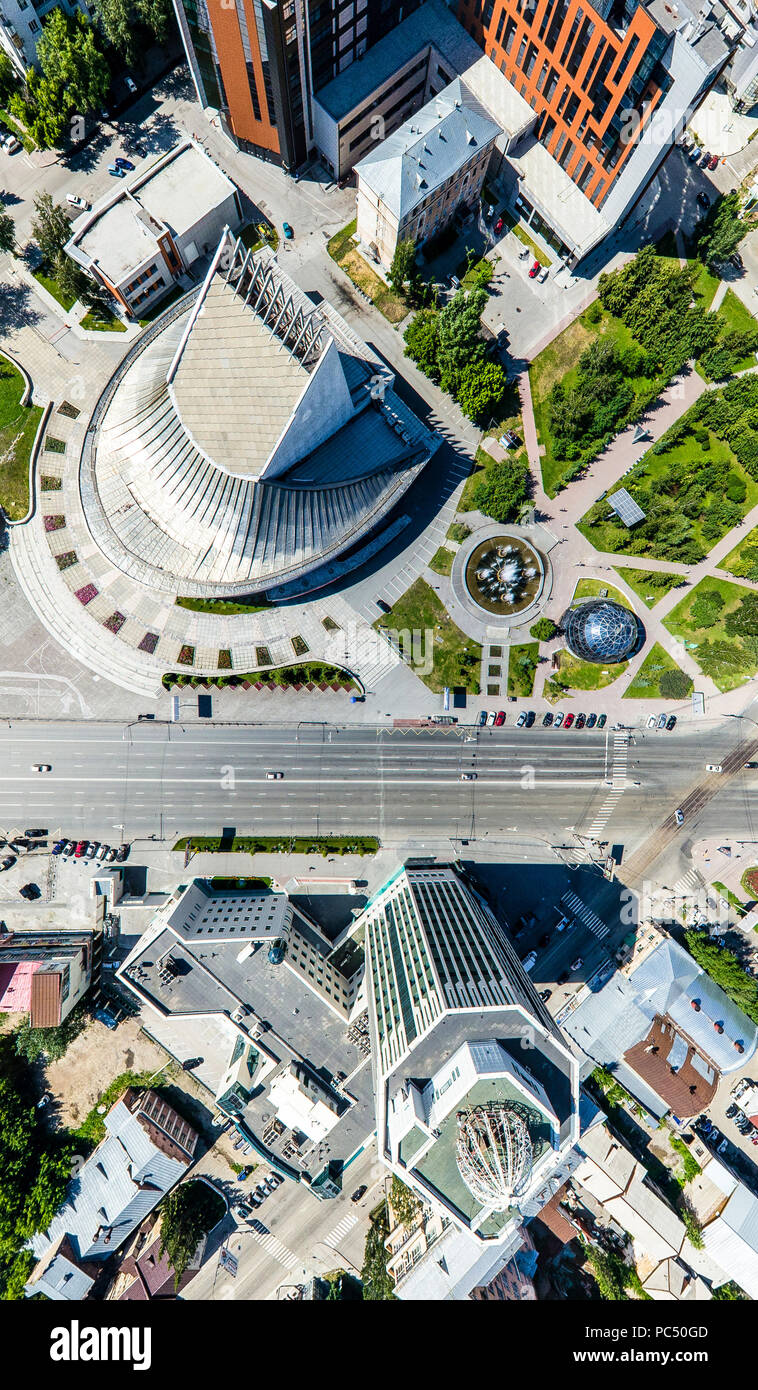 Aerial city view with roads, houses and buildings Stock Photo - Alamy